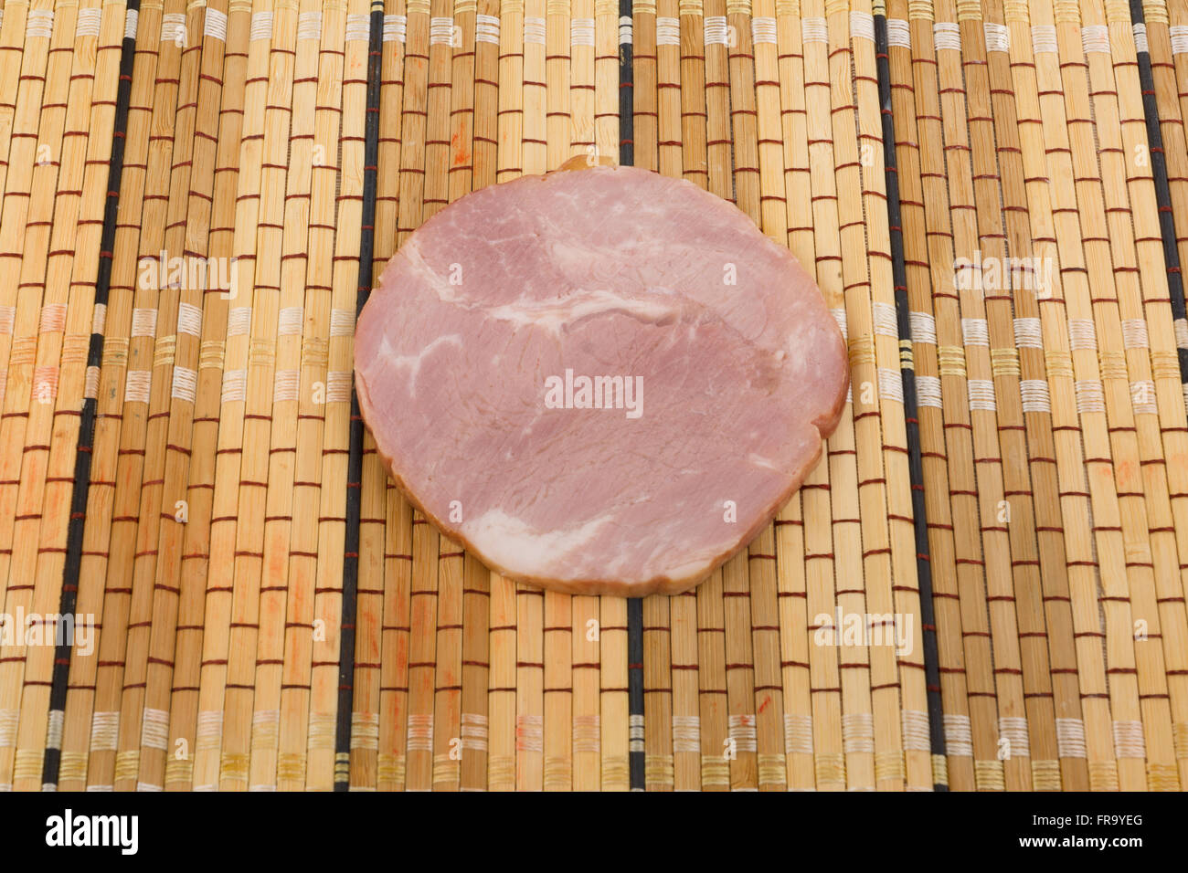 a fresh piece of meat ham on the table Stock Photo - Alamy
