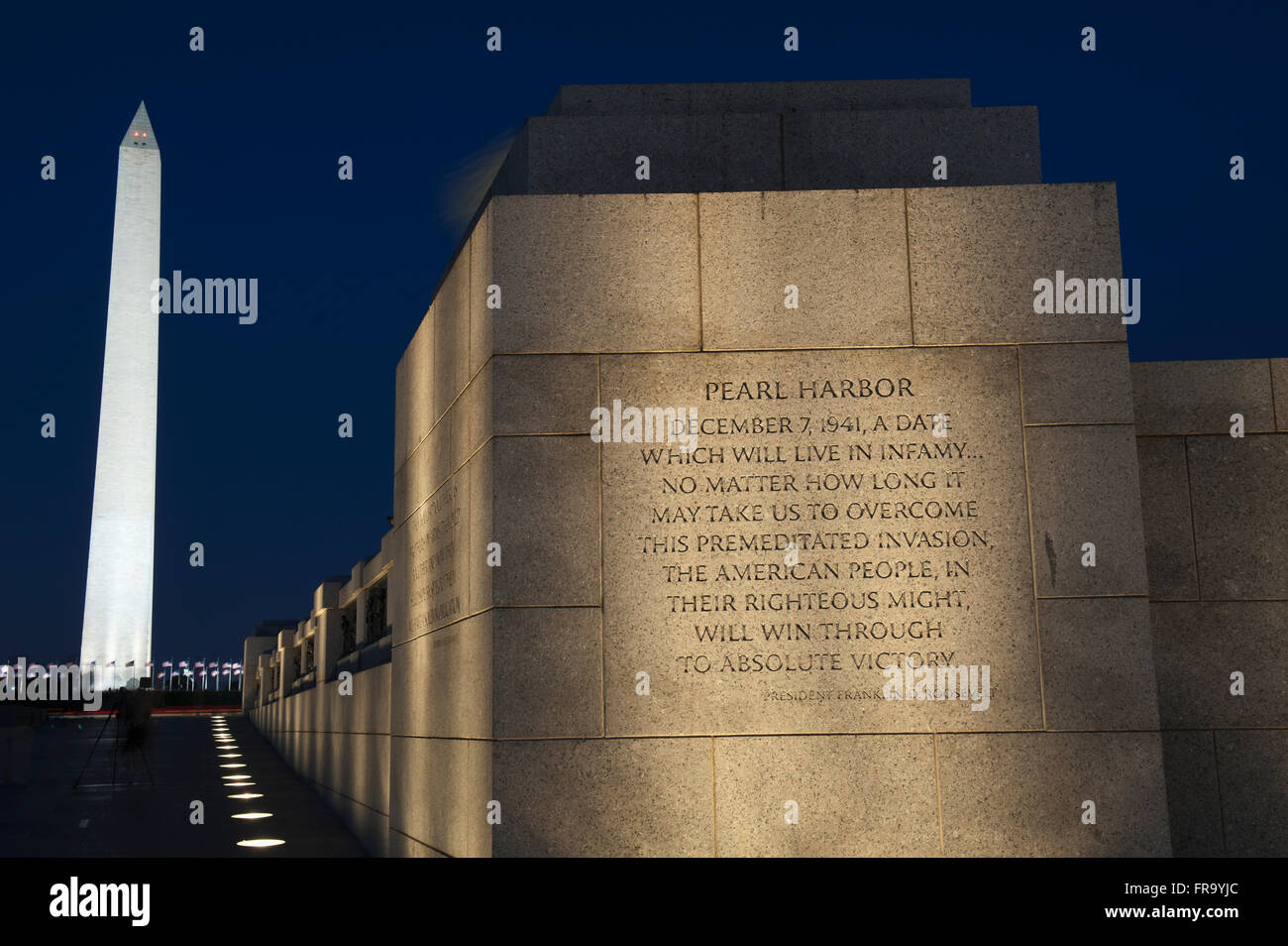Inscription at the World War II Memorial with the Washington Monument ...