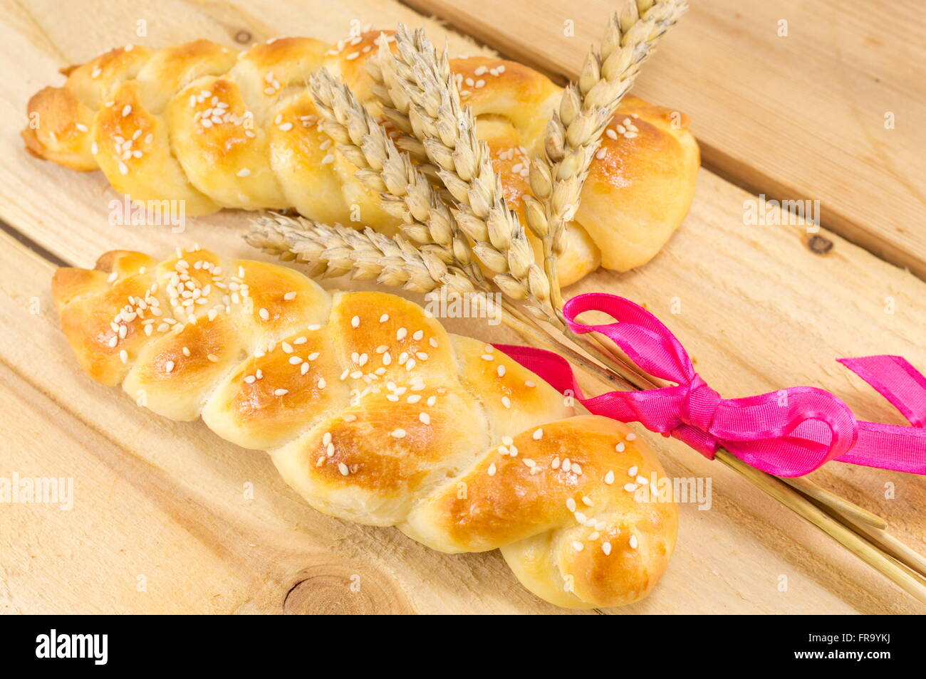 Homemade braid pastry with wheat plant and a ribbon Stock Photo - Alamy