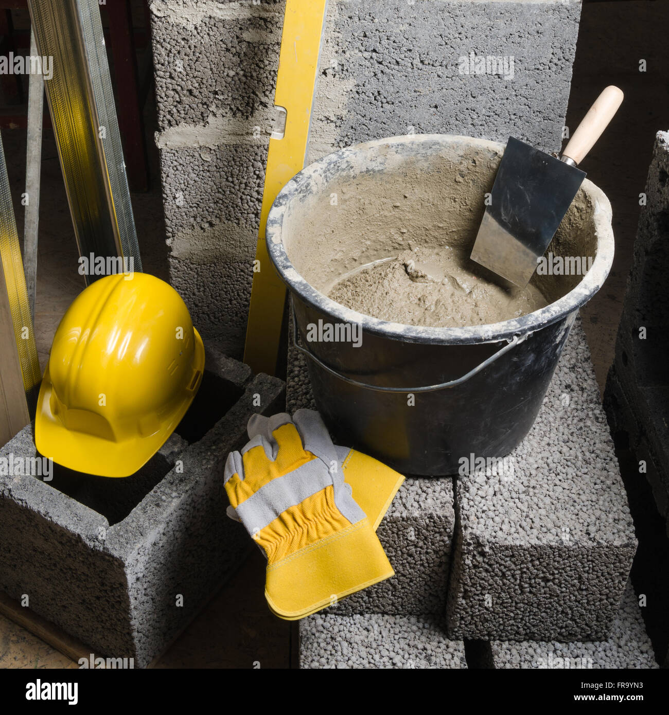 Tools for bricklayer bucket with a solution and a trowel, close-up ...