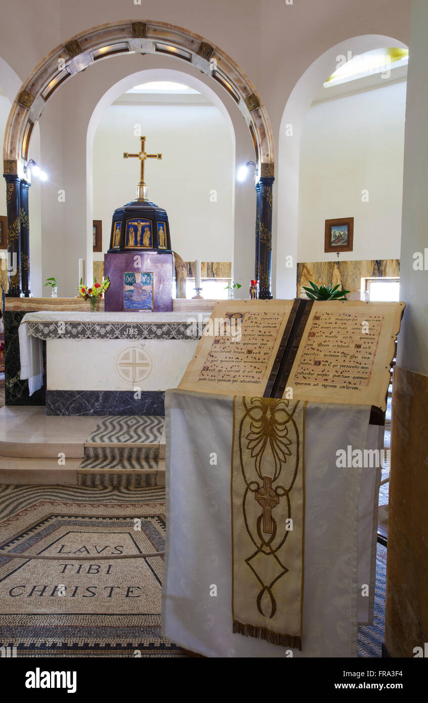Interior of a church with altar and podium with sheet music on display ...