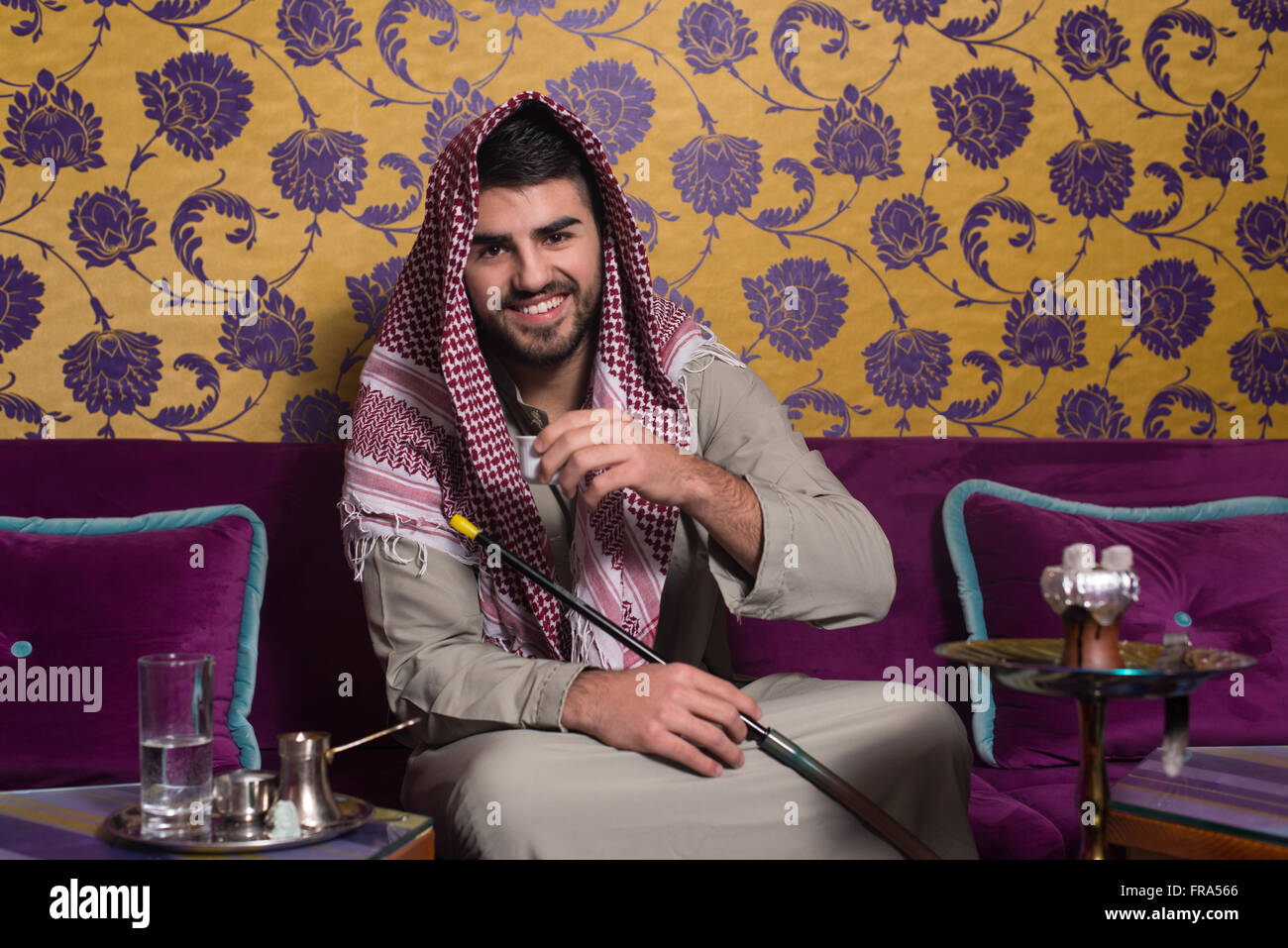 Arab man traditional arabian shisha hi-res stock photography and images ...