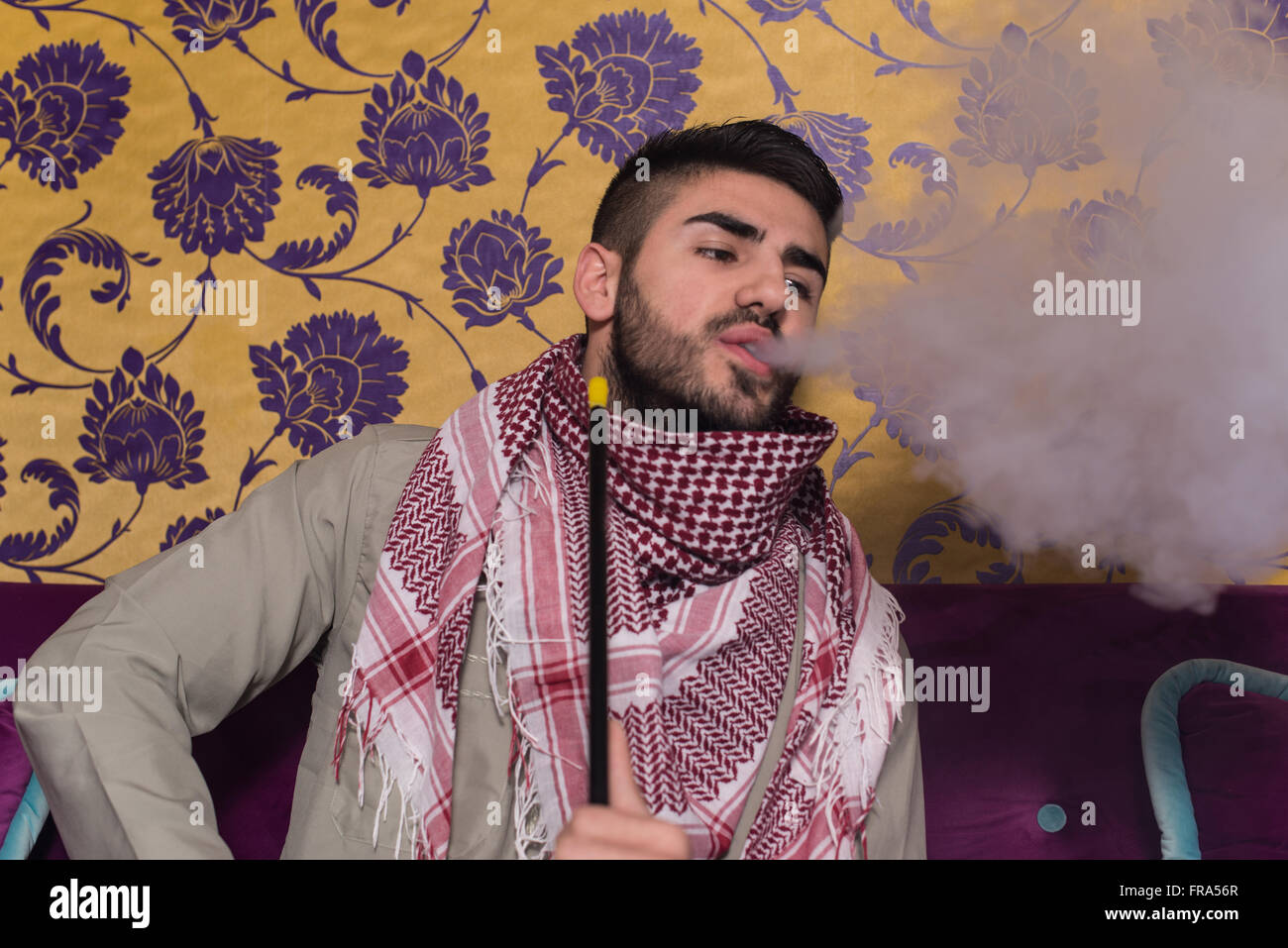Arab man smoking shisha on hi-res stock photography and images - Alamy