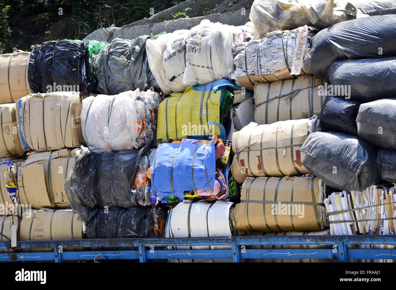 Truck loaded with compressed waste for recycling Stock Photo - Alamy
