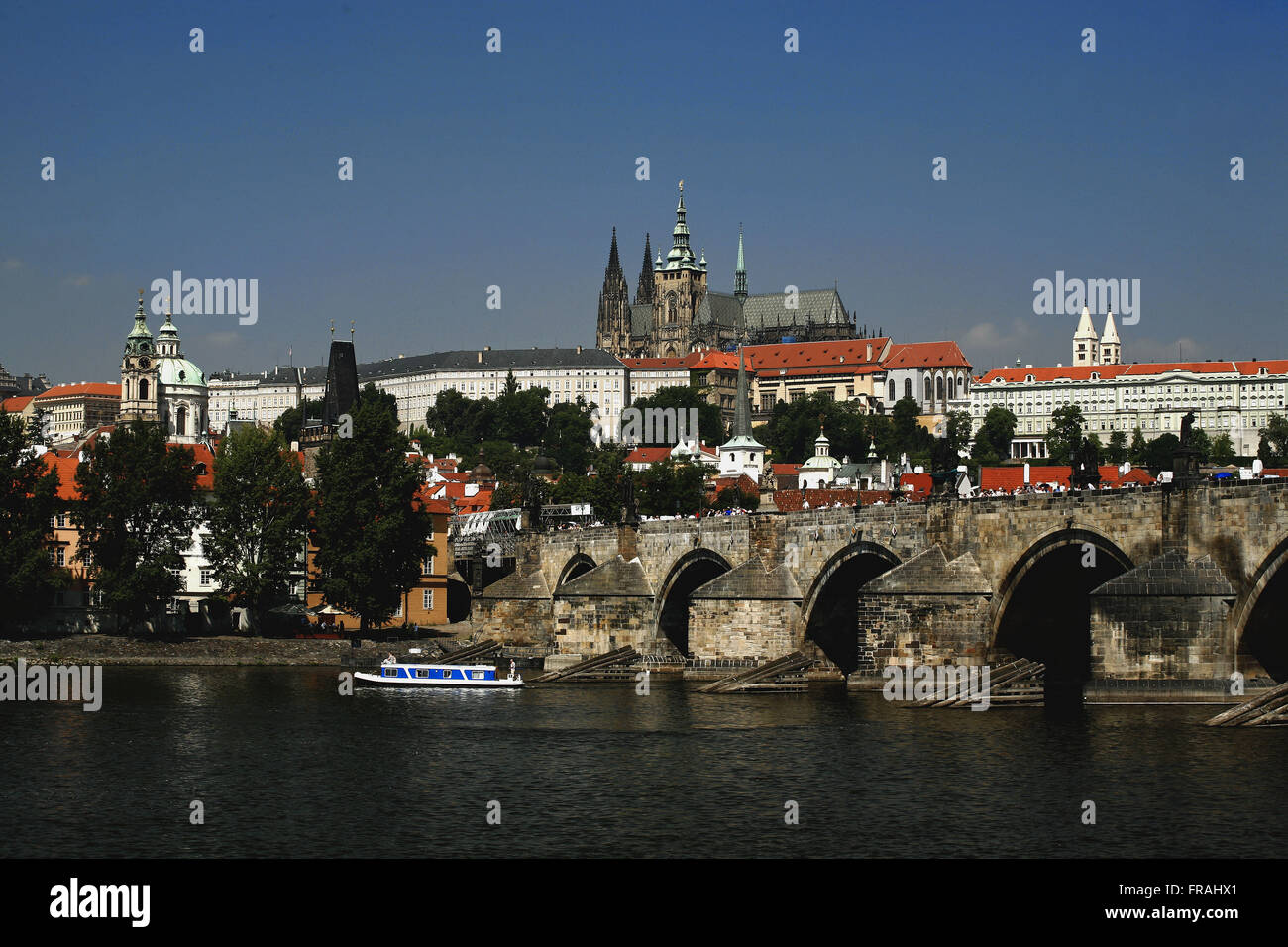 Charles Bridge in Prague - medieval castle in the background Stock ...