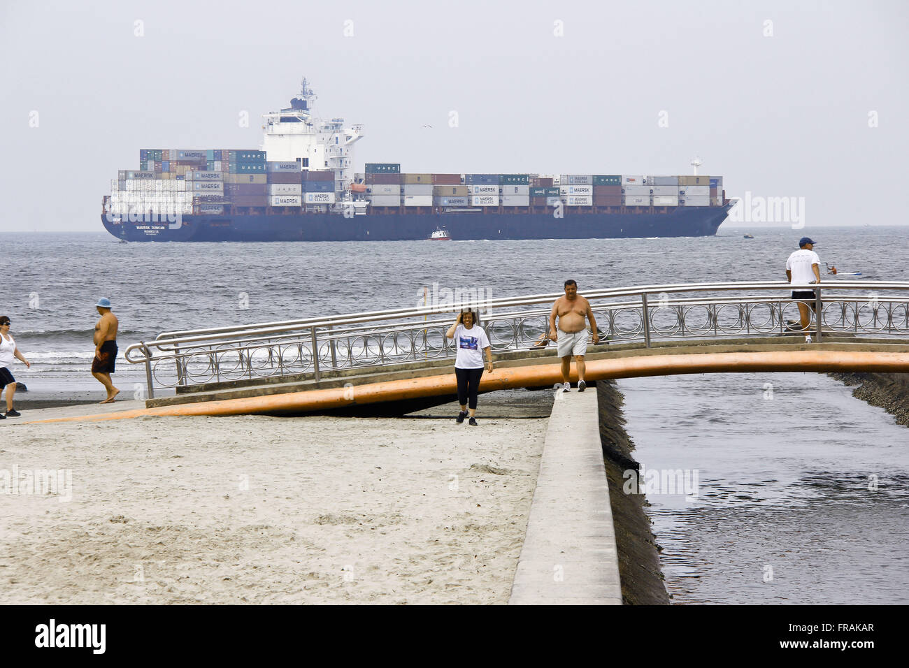 Maersk Duncan cargo ship leaving the harbor near the canal from post 6 ...