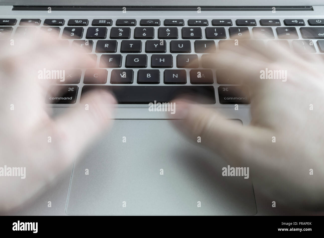 Typing macbook hi-res stock photography and images - Alamy