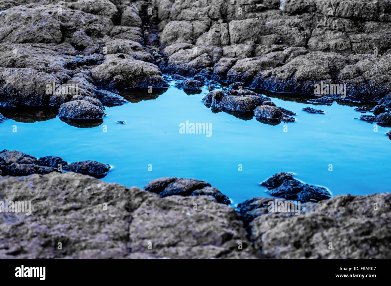 A puddle of water Stock Photo - Alamy