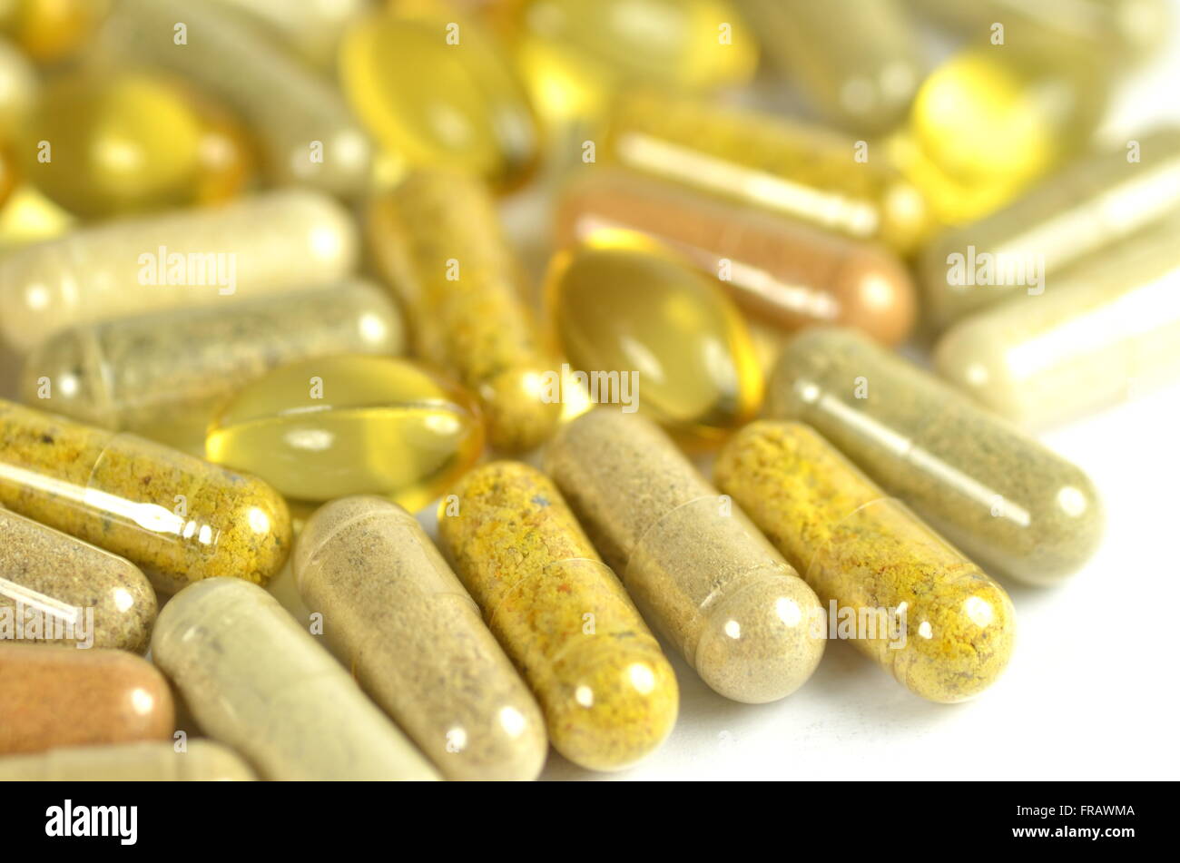 herbal capsules and fish oil capsules Stock Photo - Alamy