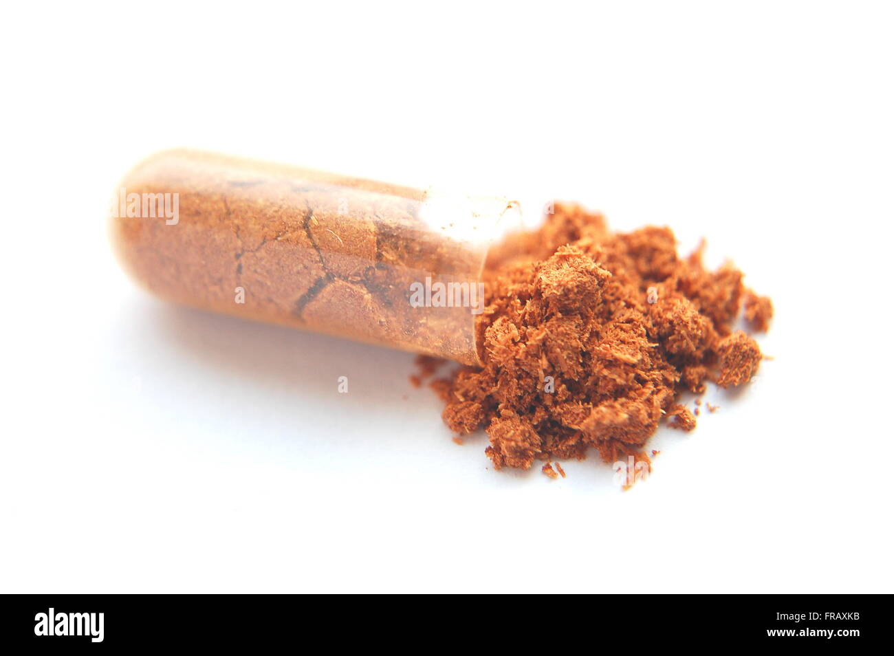 Herbal powder isolated on white background Stock Photo - Alamy