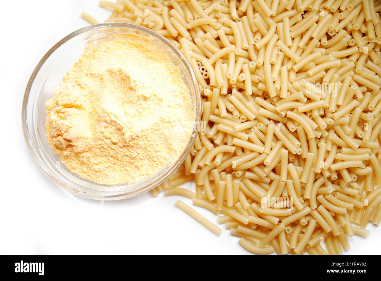 Powdered Cheese and Uncooked Pasta-Fastfood Stock Photo - Alamy