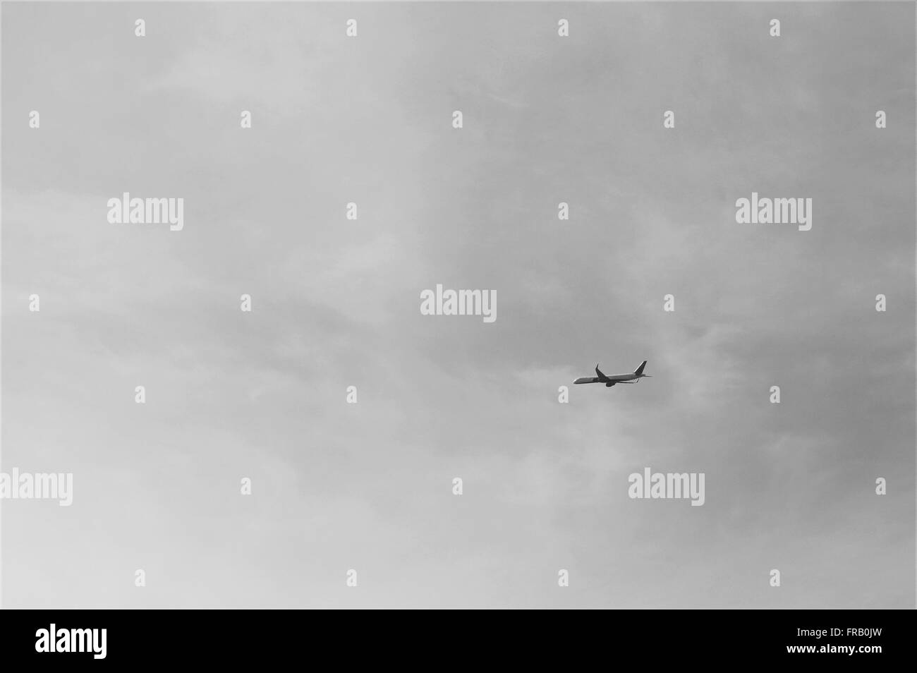 Blue sky and plane Black and White Stock Photos & Images - Alamy