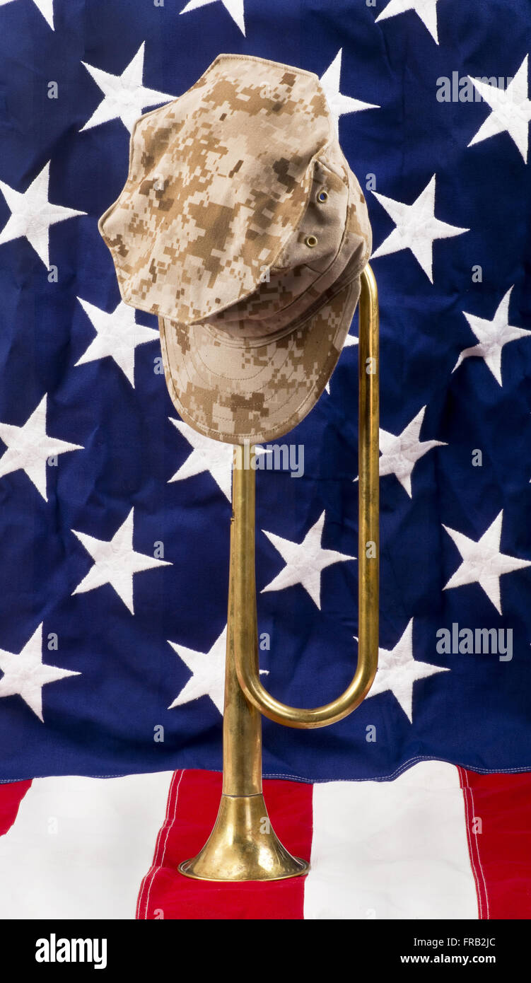 Solders brass bugle on American flag Stock Photo - Alamy