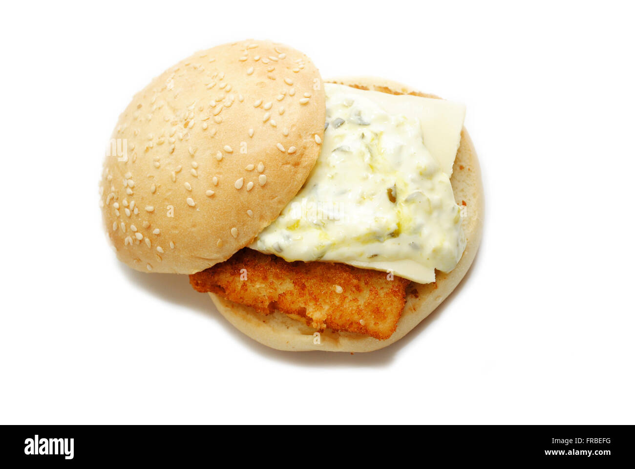 A Fish Sandwich Covered with Tartar Sauce Stock Photo - Alamy