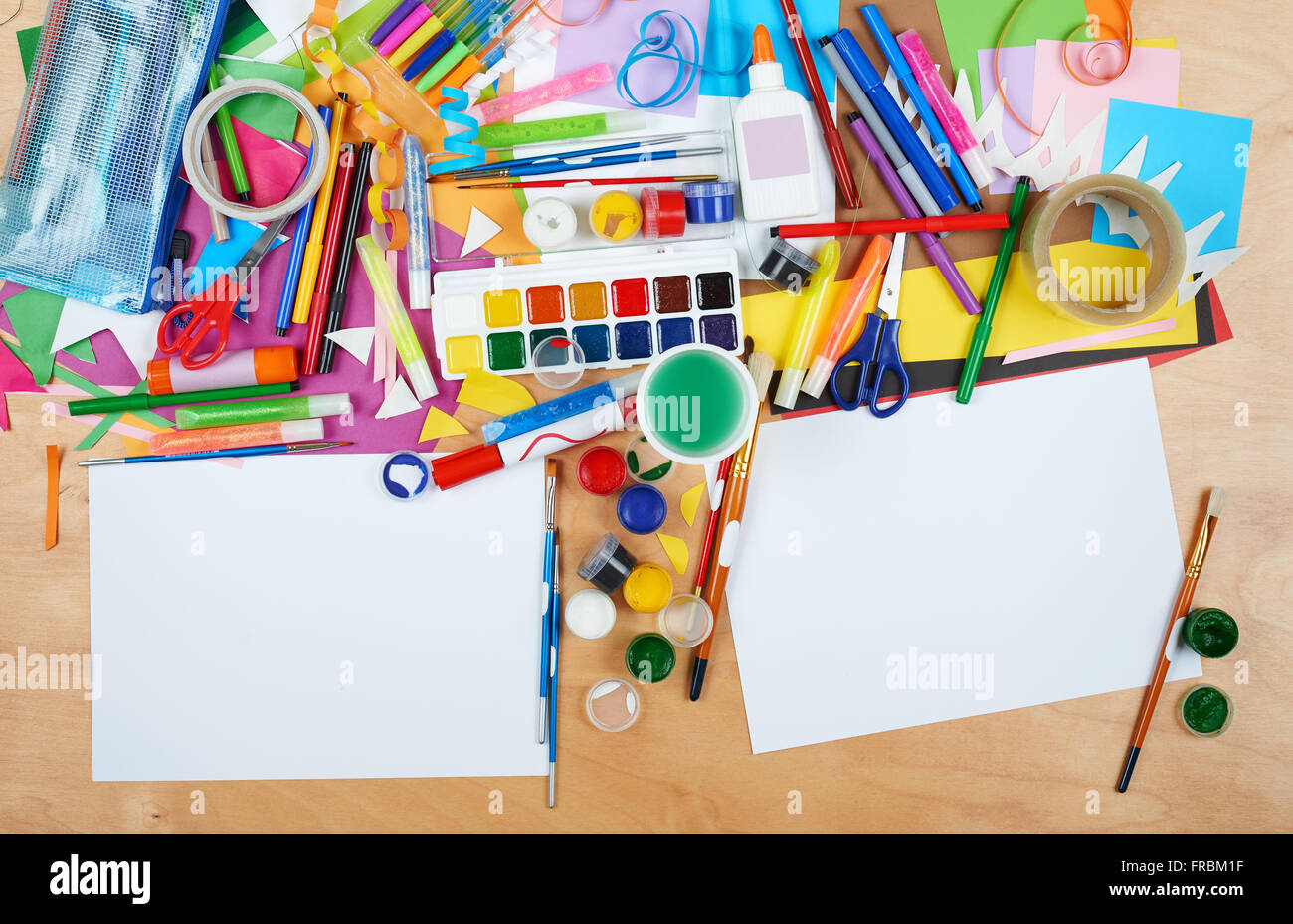 artwork workplace with creative accessories, art tools for painting and ...