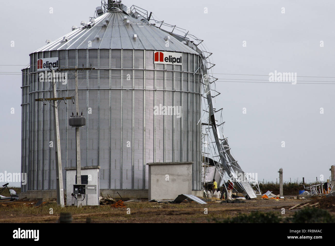 Damage caused by gale in storage silo Stock Photo - Alamy