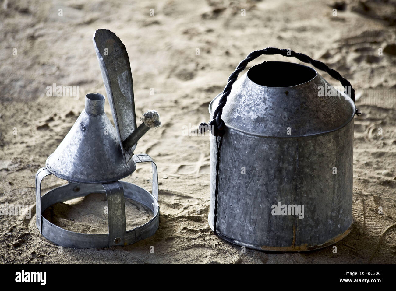 Container and poronga - kind of lamp for extraction of latex Stock ...