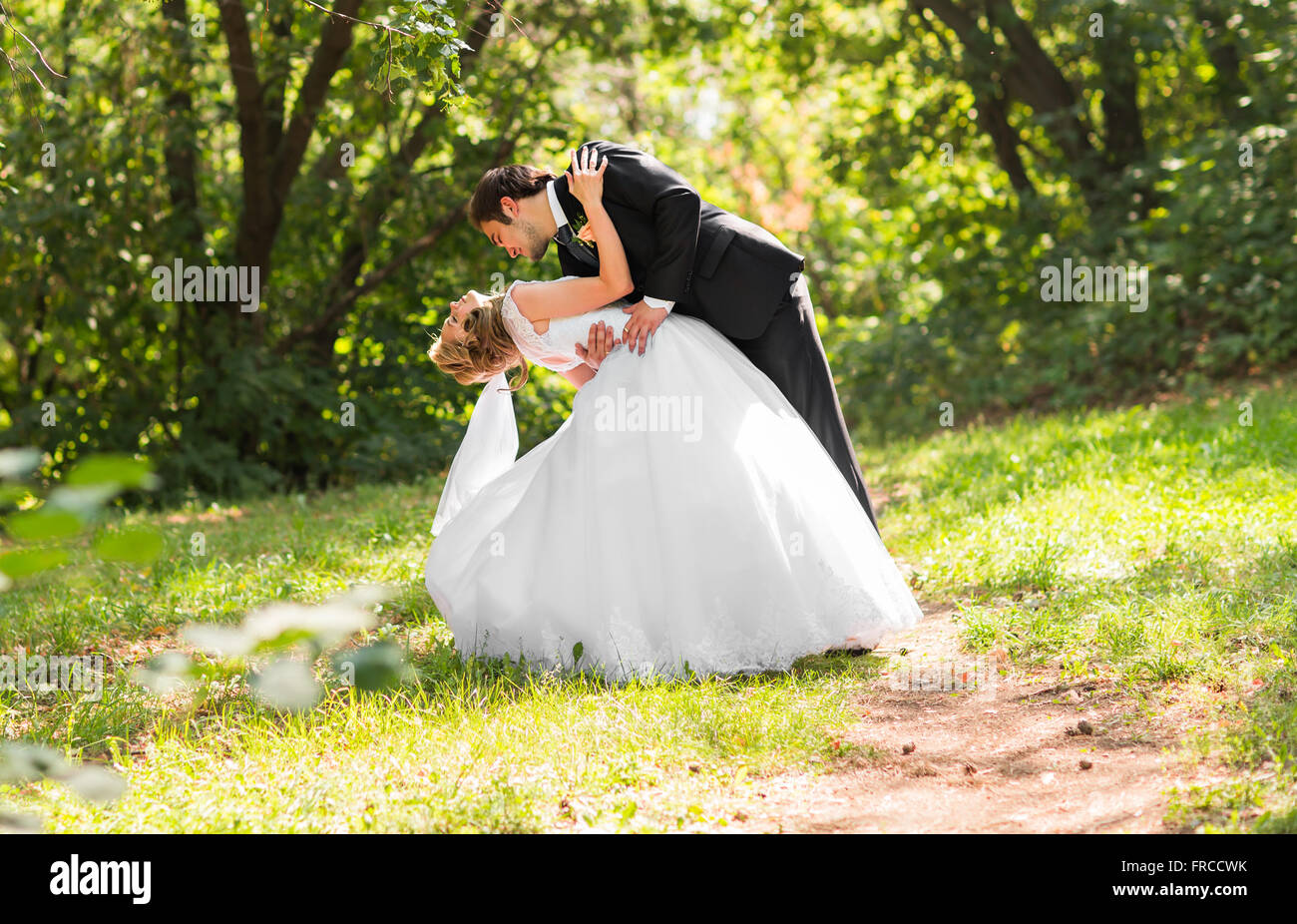 Bride and groom having a romantic moment on their wedding day Stock ...