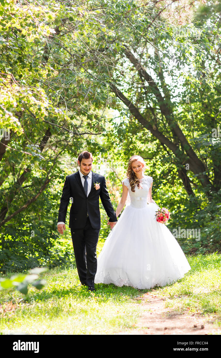Romantic wedding couple having fun together outdoor in nature Stock ...