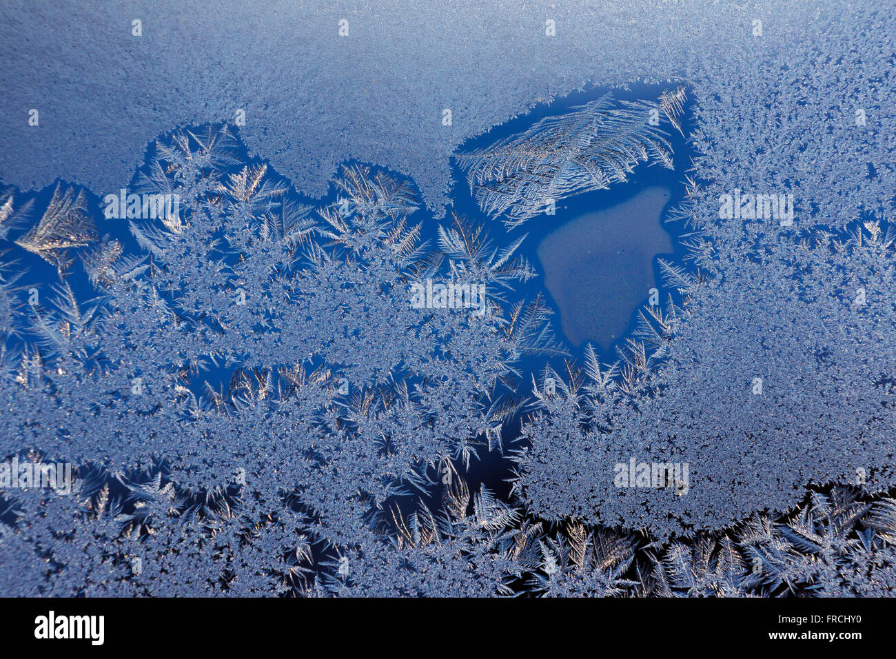 Detailed background with window ice flowers Stock Photo - Alamy