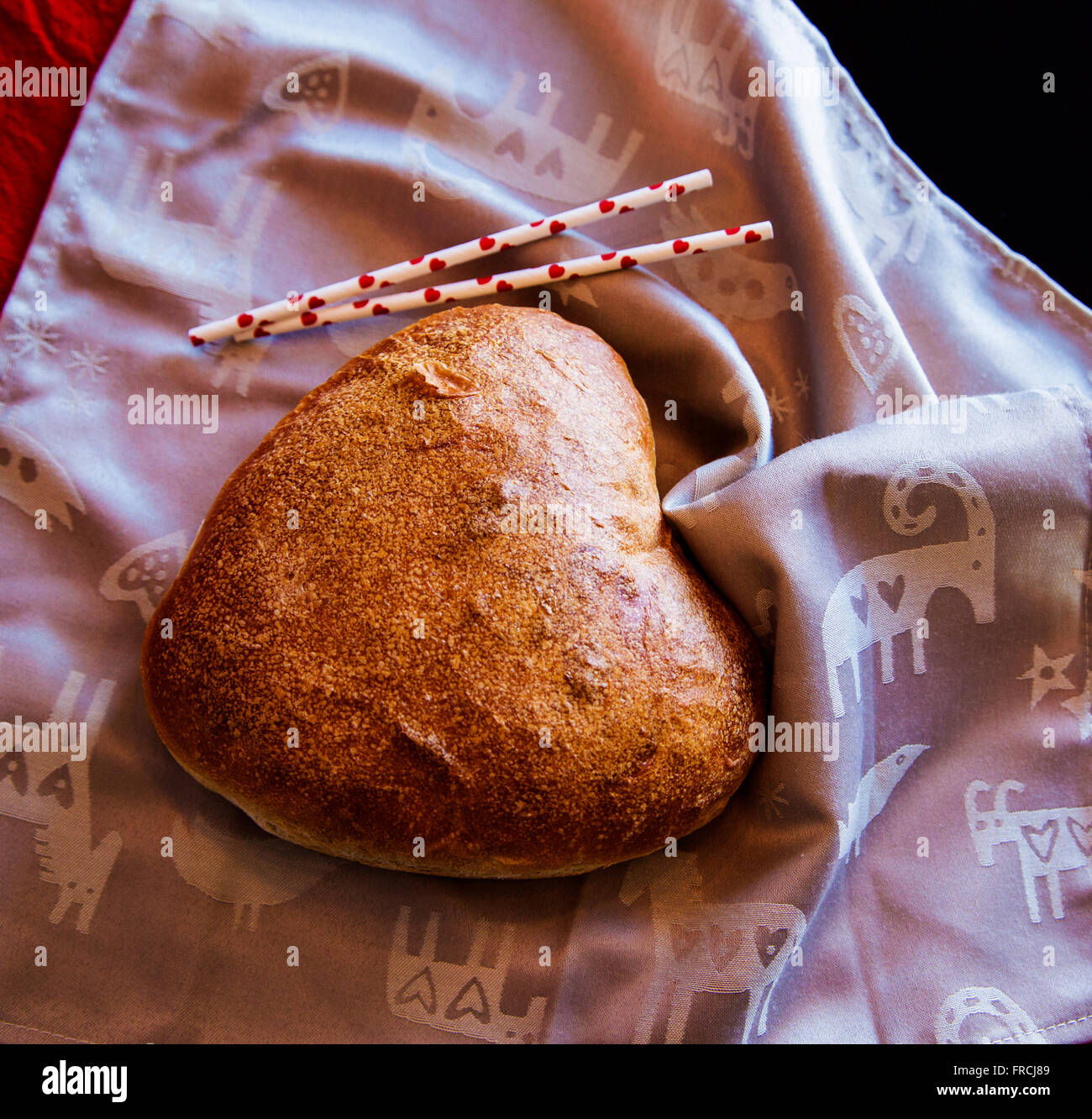 Traditional Valentines bread with red heart decorations Stock Photo - Alamy