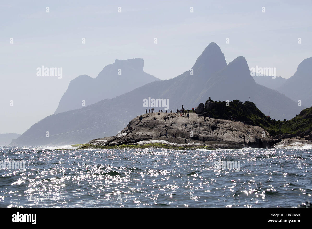 Arpoador Rock with Hill Brothers and Sugar Loaf in the background Stock ...
