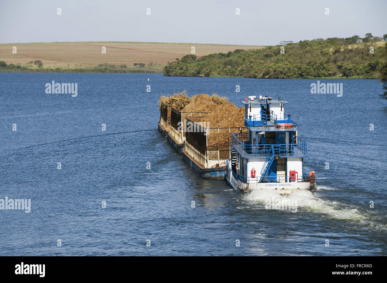 Barge loaded with sugarcane bagasse browsing the Rio Tietê Stock Photo ...