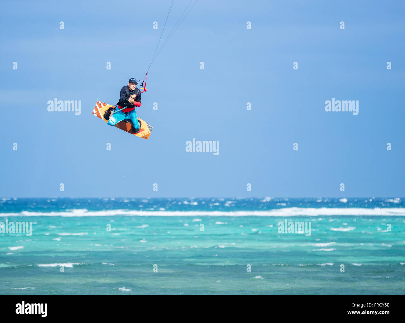 Kiteboarder performing a jump Stock Photo - Alamy