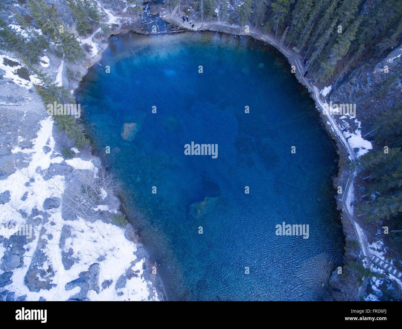 Small glacier lake in Canmore Alberta surrounded by the rockies Stock ...