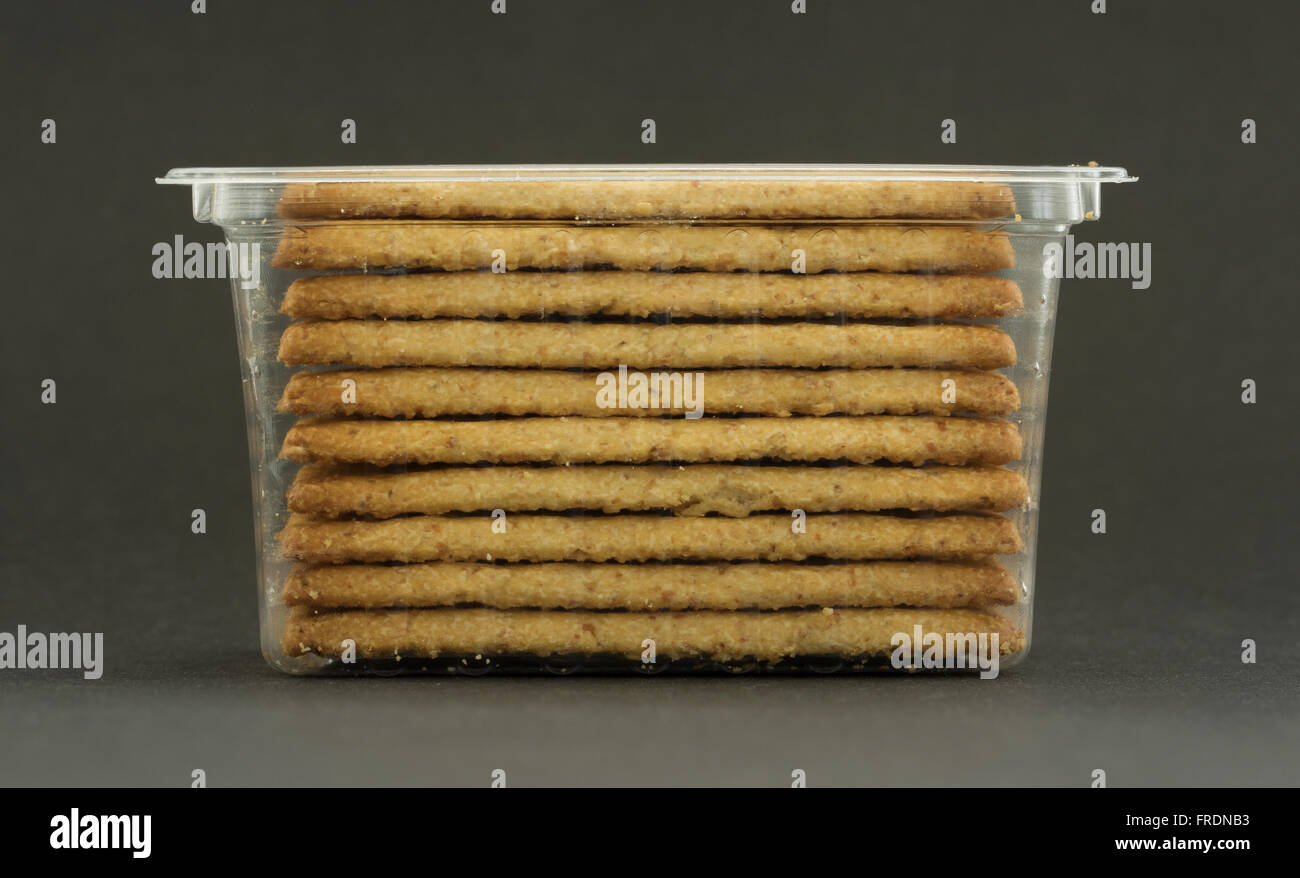 Crackers in plastic, isolated on a grey background Stock Photo - Alamy