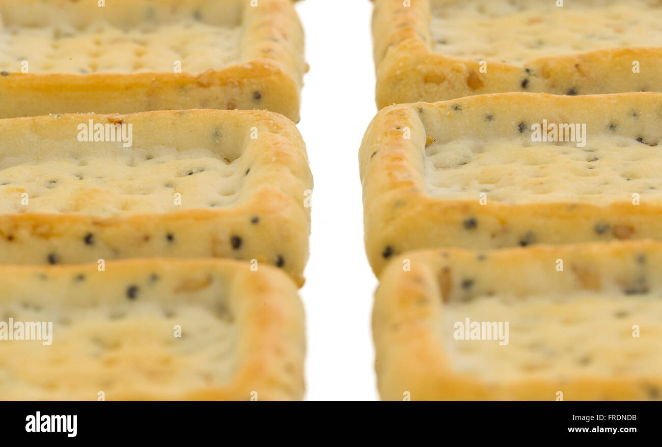 Simple square crackers isolated on a white background, selective focus ...