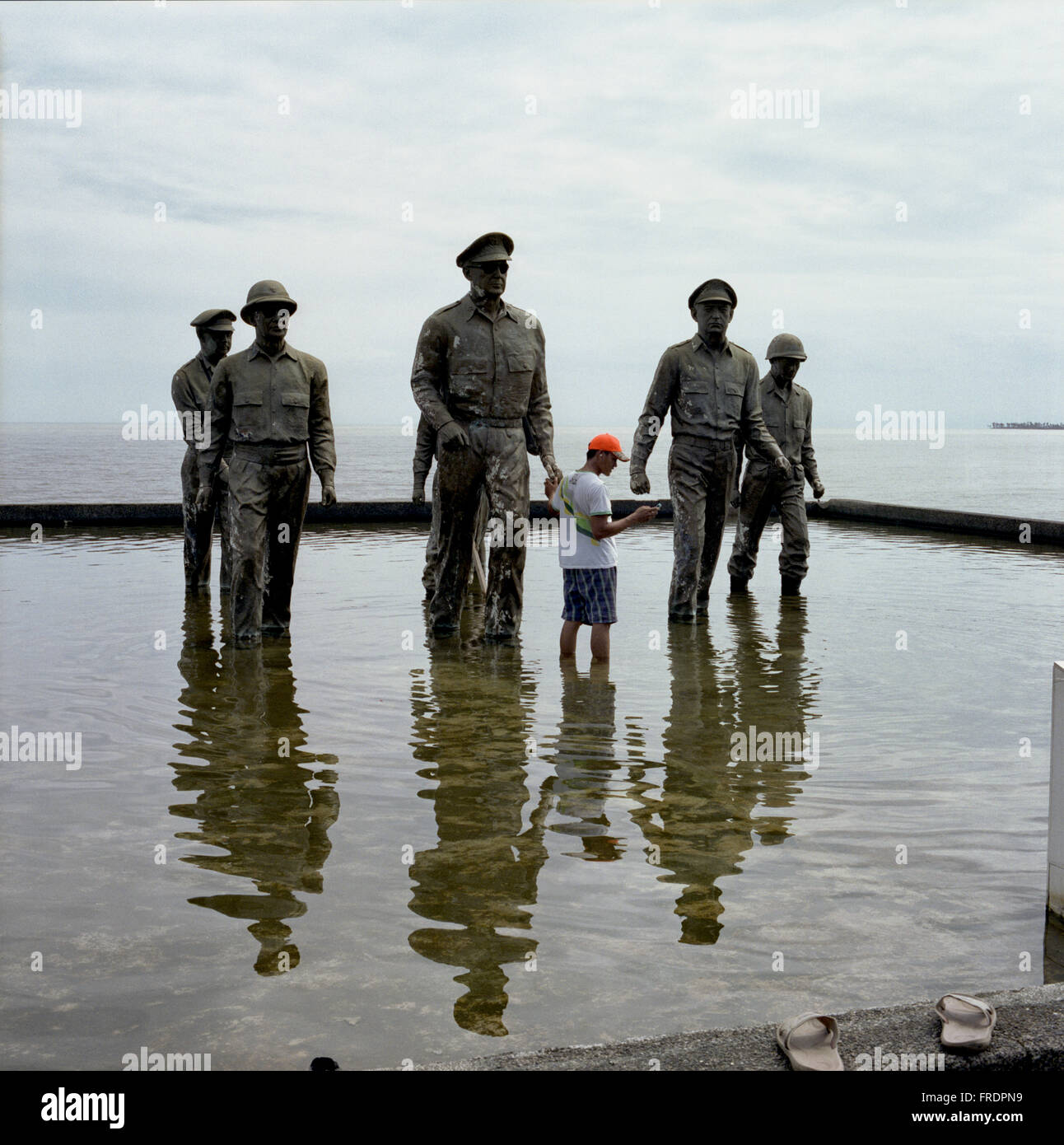 Palo; Leyte; Philippines - January 5, 2014: A man is seen at the Leyte ...