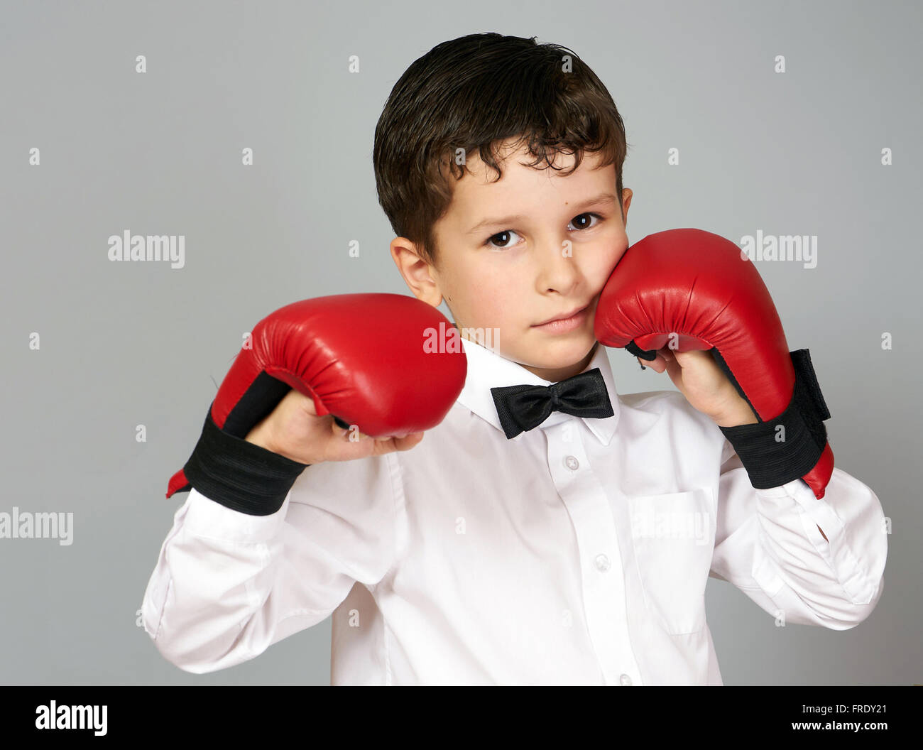 Child with bow tie hi-res stock photography and images - Alamy