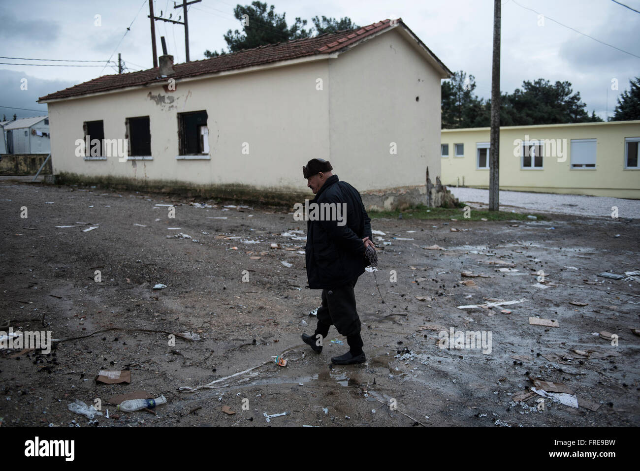 An elderly man walks inside the Diavata refugee camp, near the northern ...
