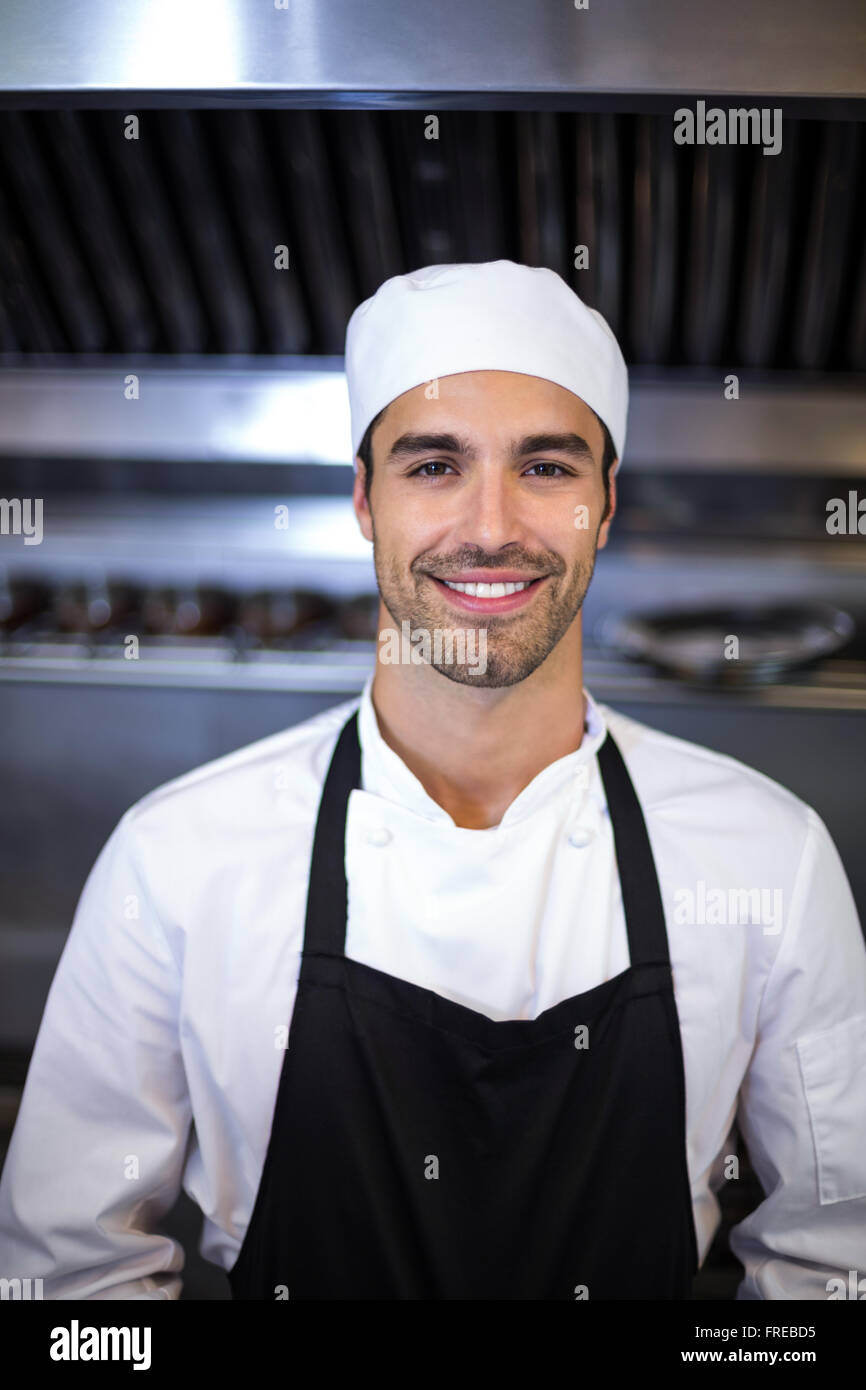 Handsome chef looking at camera Stock Photo - Alamy