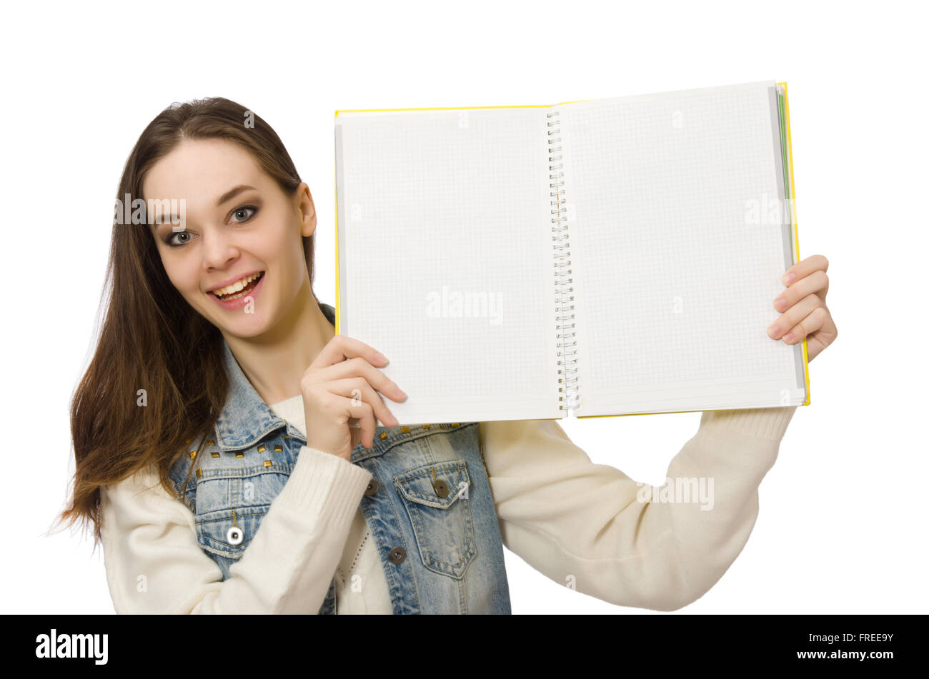 Pretty student holding blank notebook isolated on white Stock Photo - Alamy
