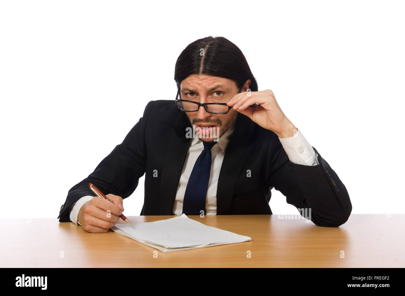 Businessman writing at workplace isolated on white Stock Photo - Alamy
