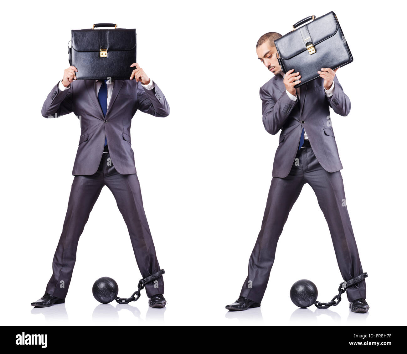 Businessman with shackles on white Stock Photo - Alamy