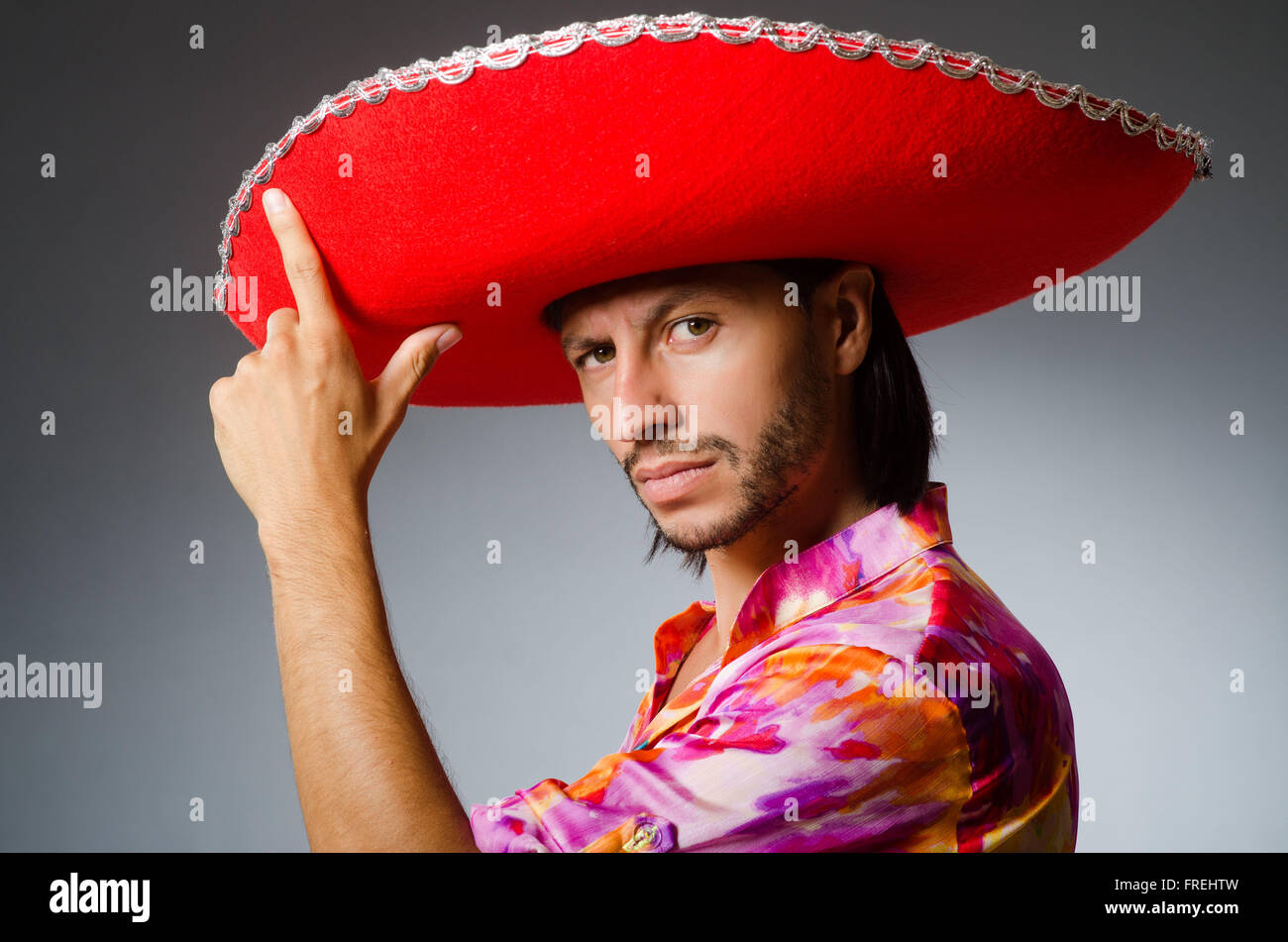Young mexican man wearing sombrero Stock Photo - Alamy