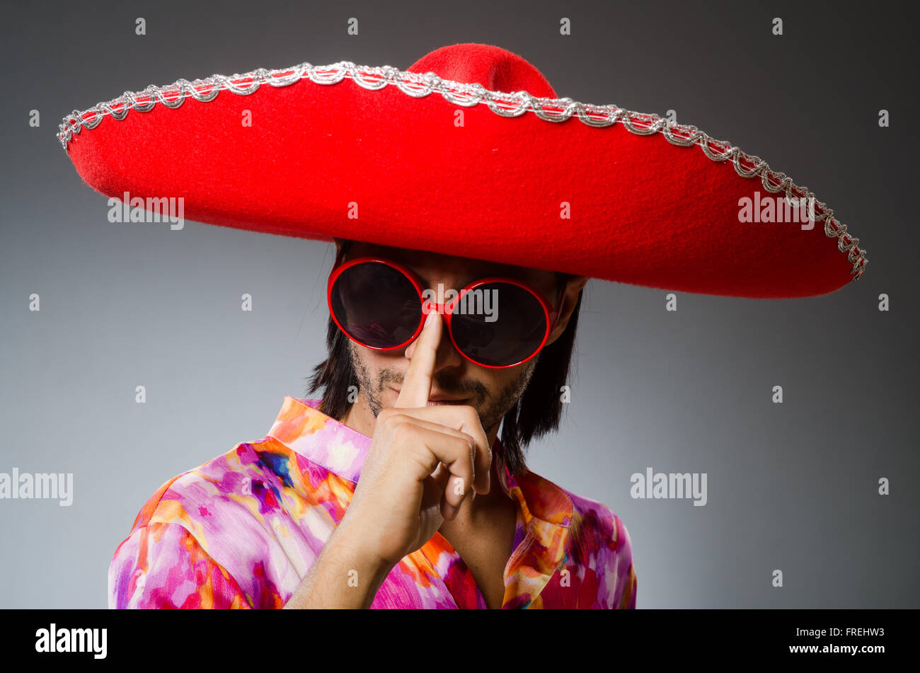 Young mexican man wearing sombrero Stock Photo - Alamy