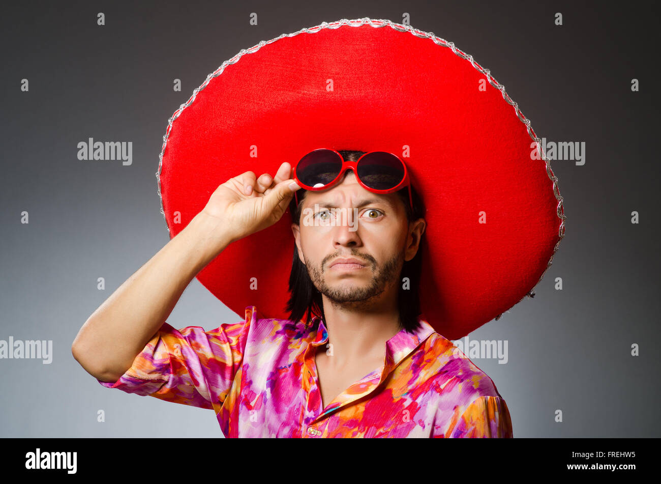 Young mexican man wearing sombrero Stock Photo - Alamy