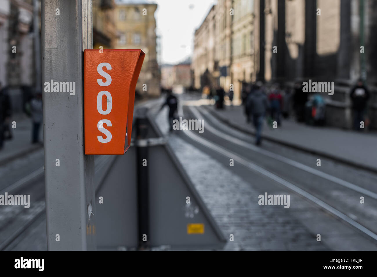Sign SOS on the pole. Road traffic background Stock Photo - Alamy