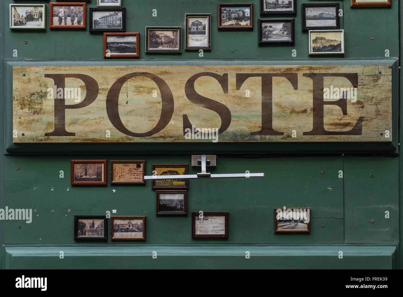 Poste signnboard hanging on the green wall close up Stock Photo - Alamy