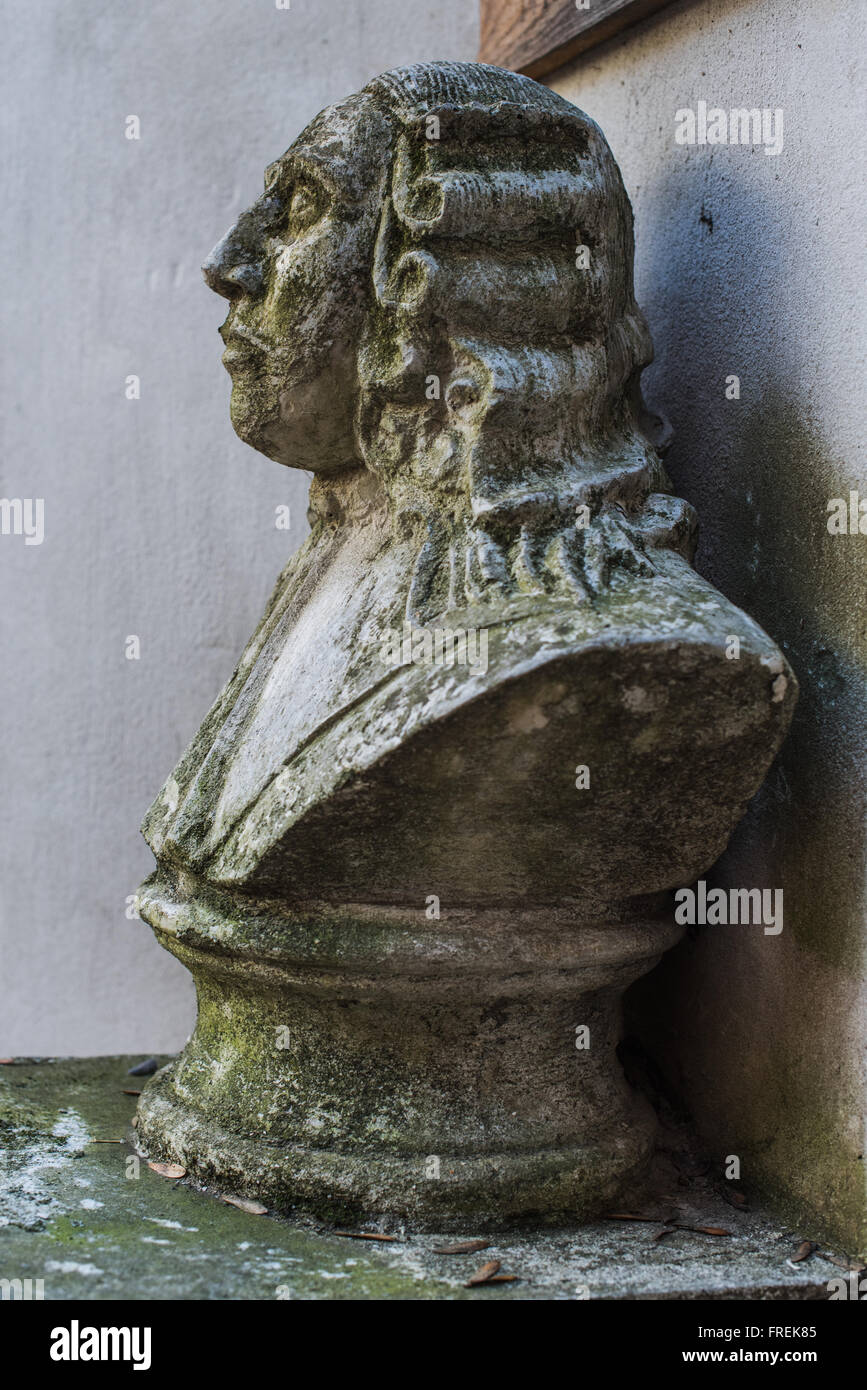 Old bust of victorian man covered with moss Stock Photo - Alamy