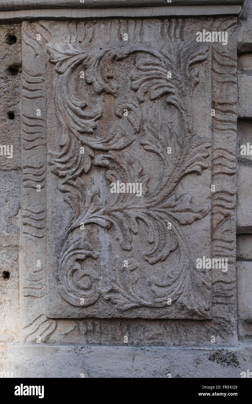 Old abstract bas-relief on the wall close up Stock Photo - Alamy