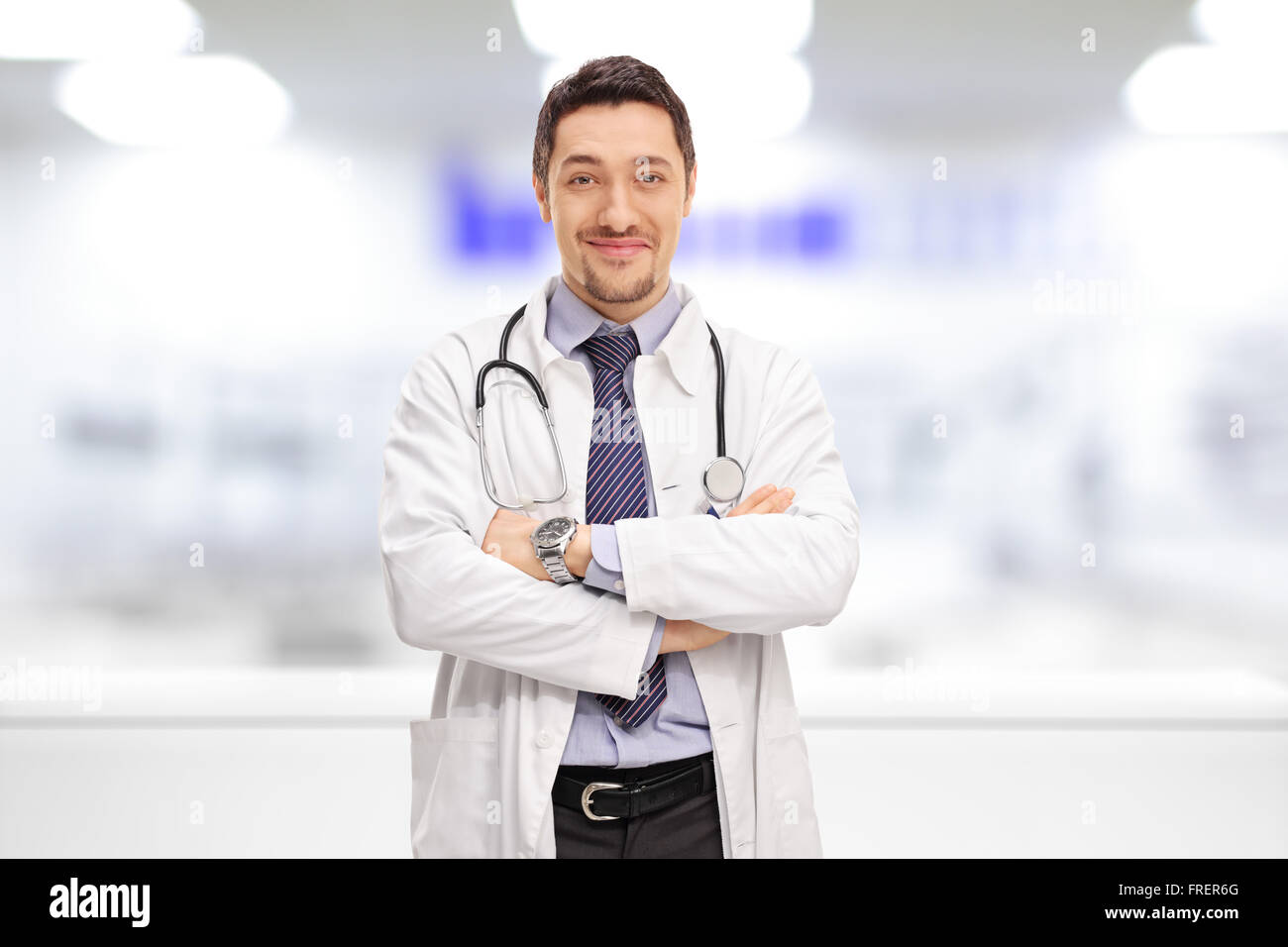 Professional doctor standing posing camera hi-res stock photography and ...