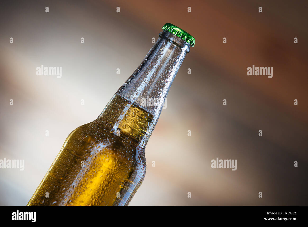 Bottle with beer wtih drops Stock Photo - Alamy
