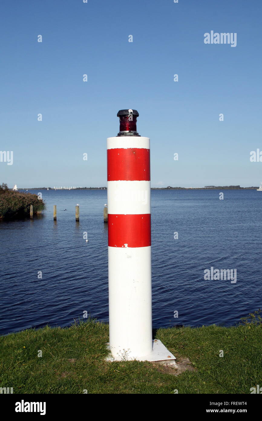 Beacon for ships in the harbour of Oostmahorn. The Netherlands Stock ...