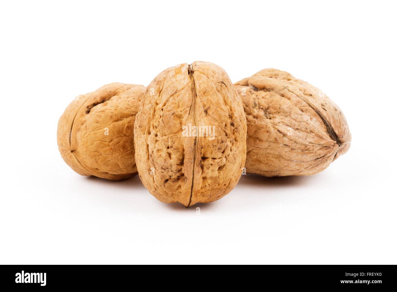 Nuts on a white background Stock Photo - Alamy
