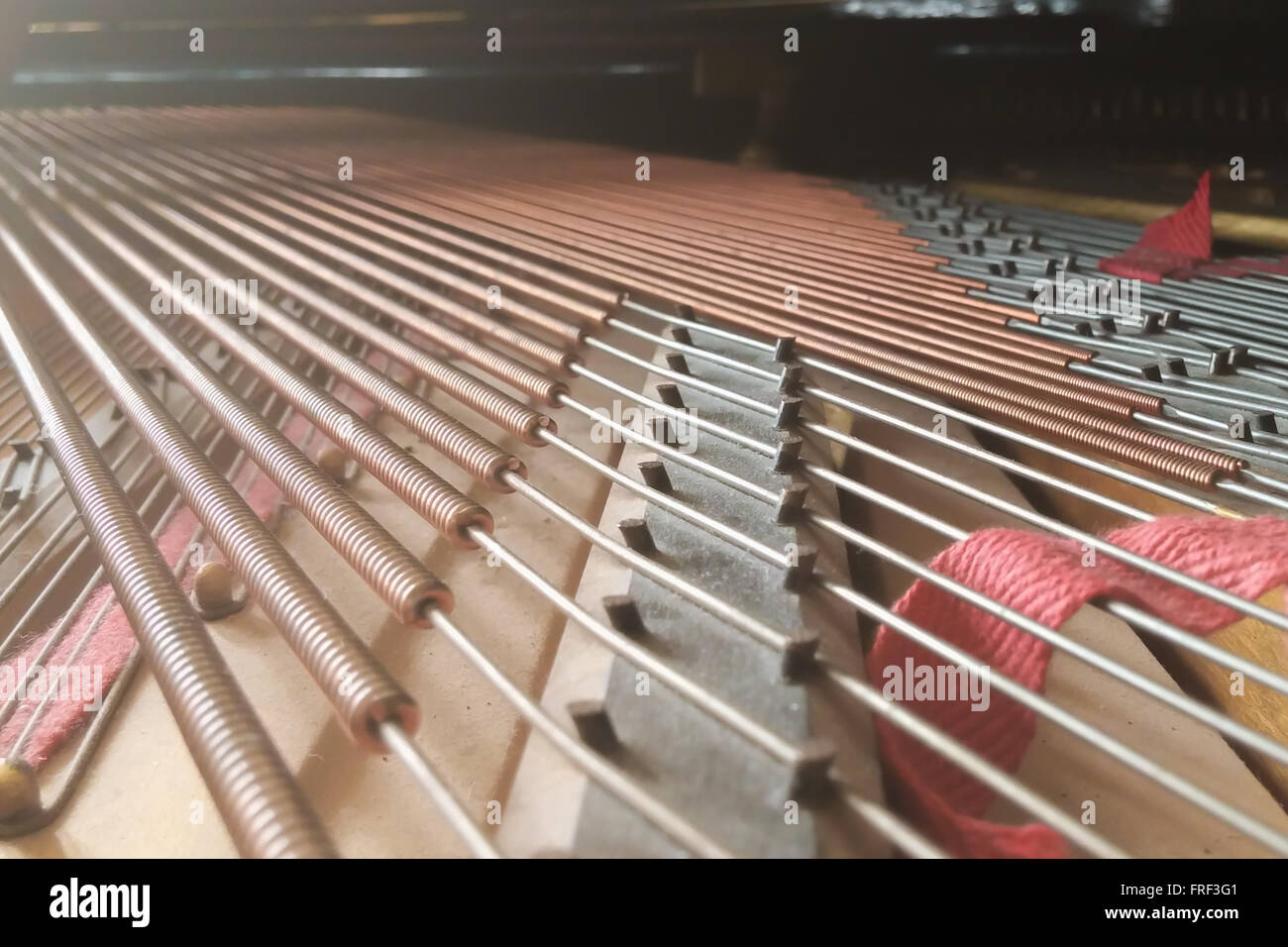 the strings inside a piano Stock Photo - Alamy